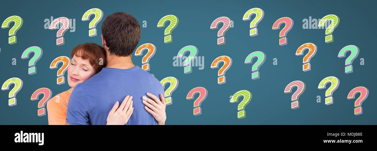Couple with colorful funky question marks Stock Photo - Alamy