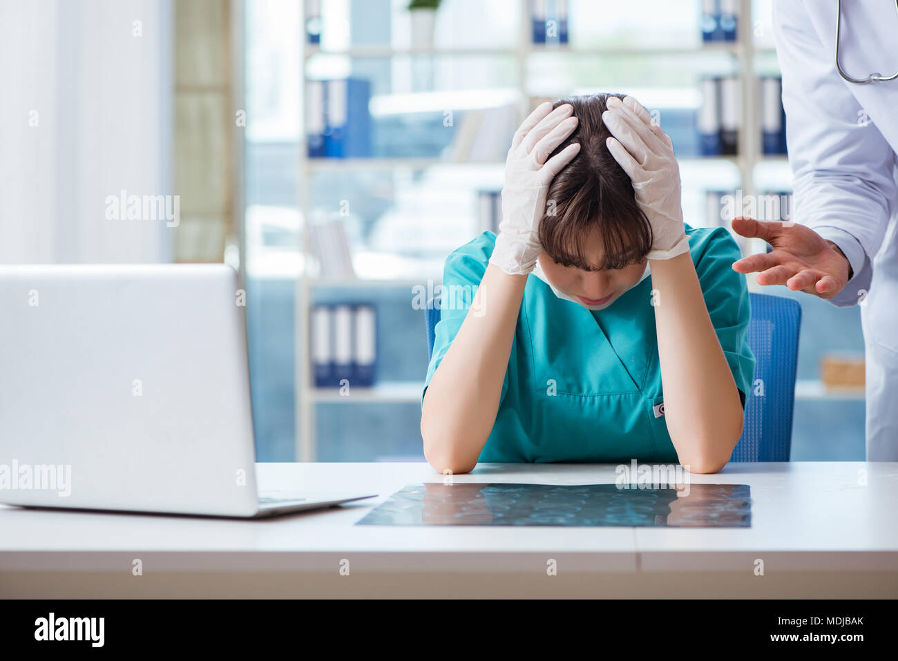 Doctor angry at his assistant due to medical error Stock Photo - Alamy
