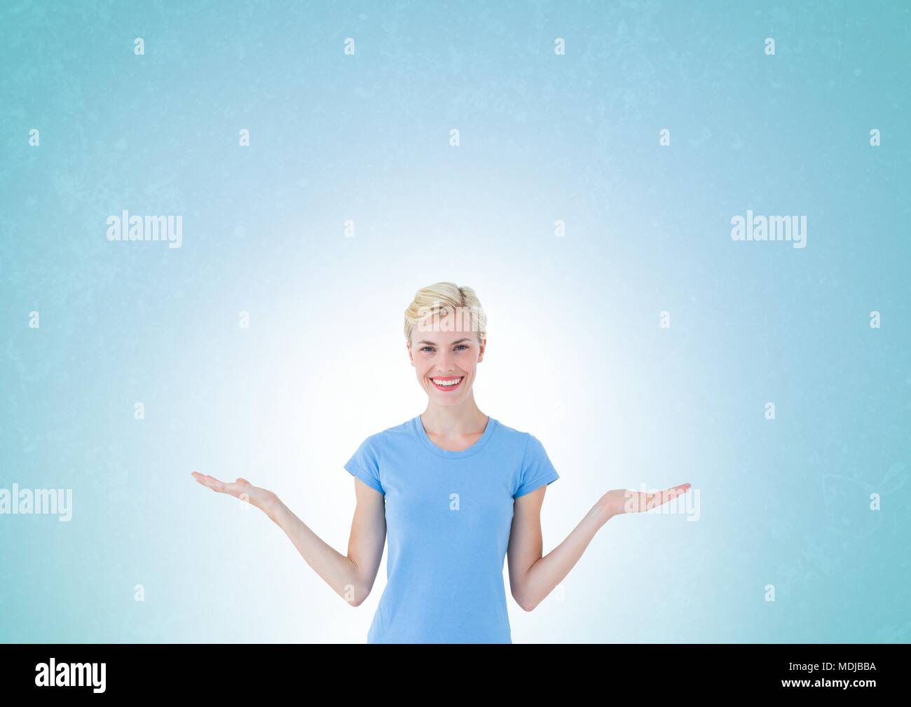 Woman thinking choosing in front of blue background Stock Photo - Alamy