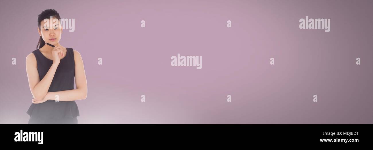 Woman thinking in front of pink background Stock Photo - Alamy