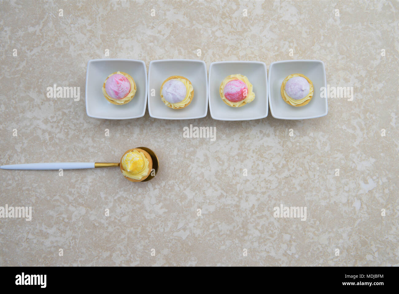 flat lay with mini pastry desserts Stock Photo - Alamy