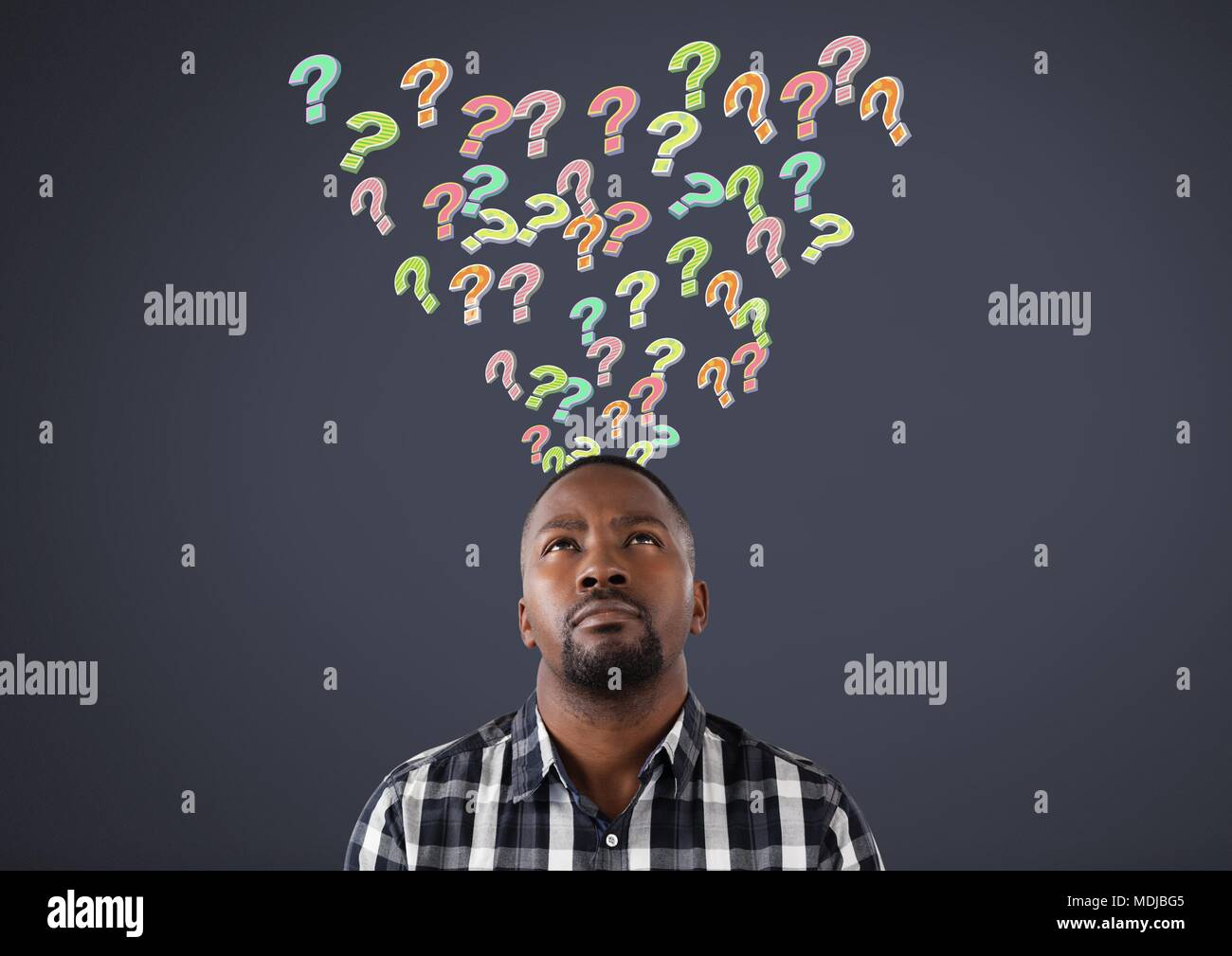 Man with colorful funky question marks emerging from head Stock Photo ...