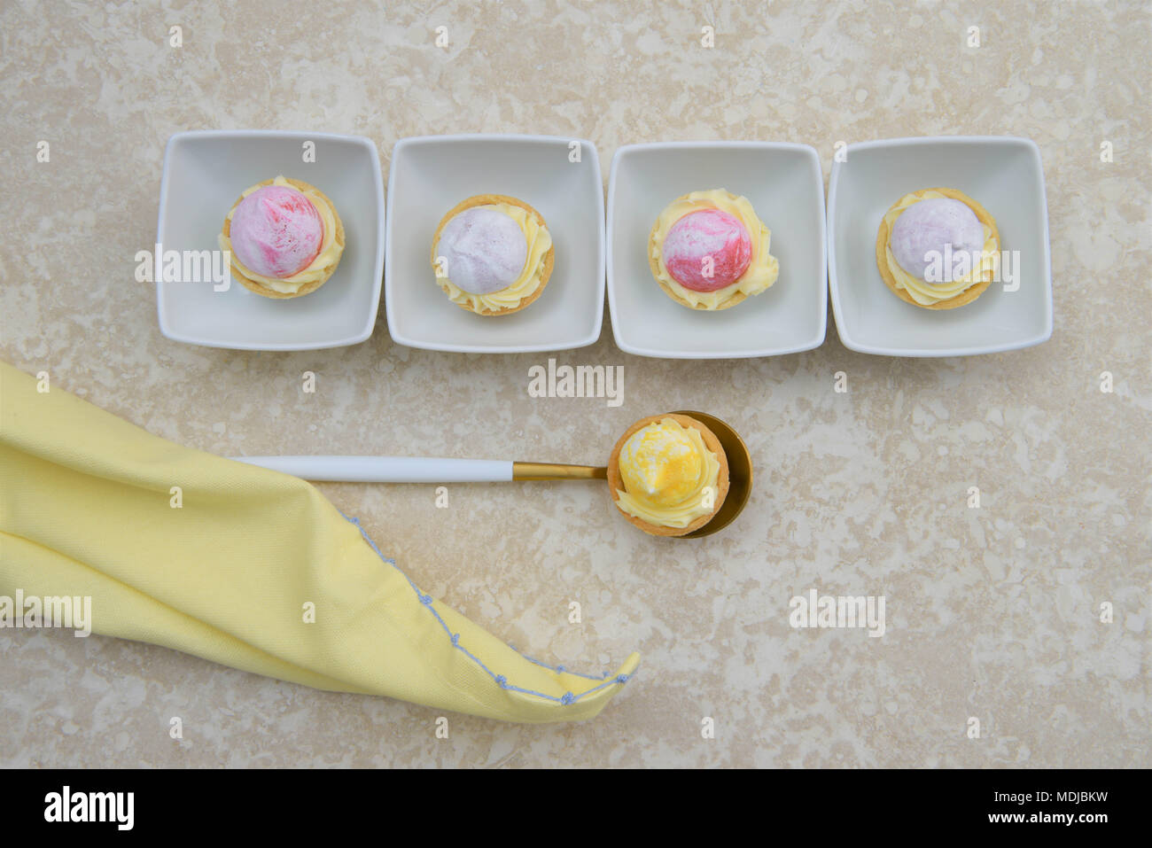 flat lay with mini pastry desserts Stock Photo - Alamy