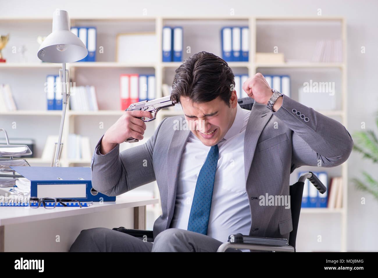 Disabled businessman on wheelchair in disability concept Stock Photo ...