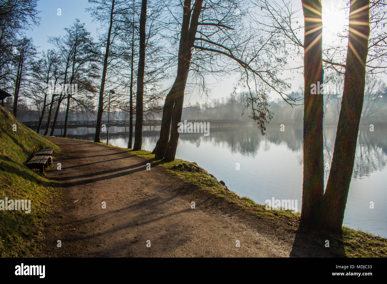 A pleasant walk around a lake Stock Photo - Alamy