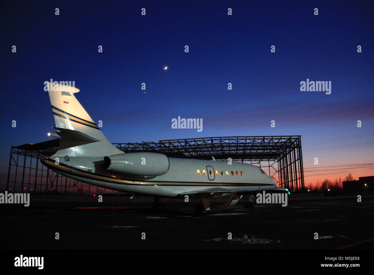 Falcon 2000 business jet is waiting for passengers and ready to go ...