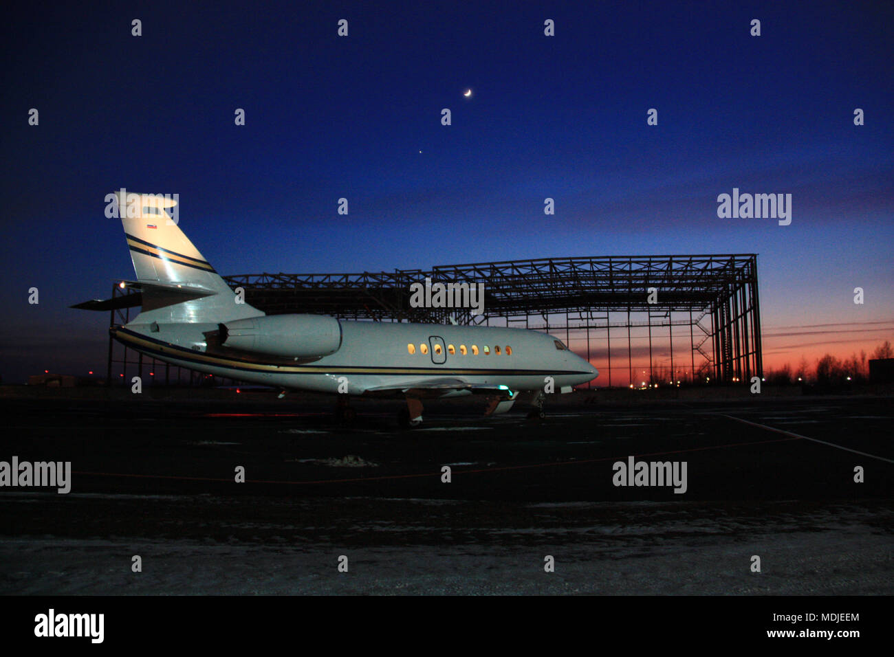 Falcon 2000 business jet is waiting for passengers and ready to go ...