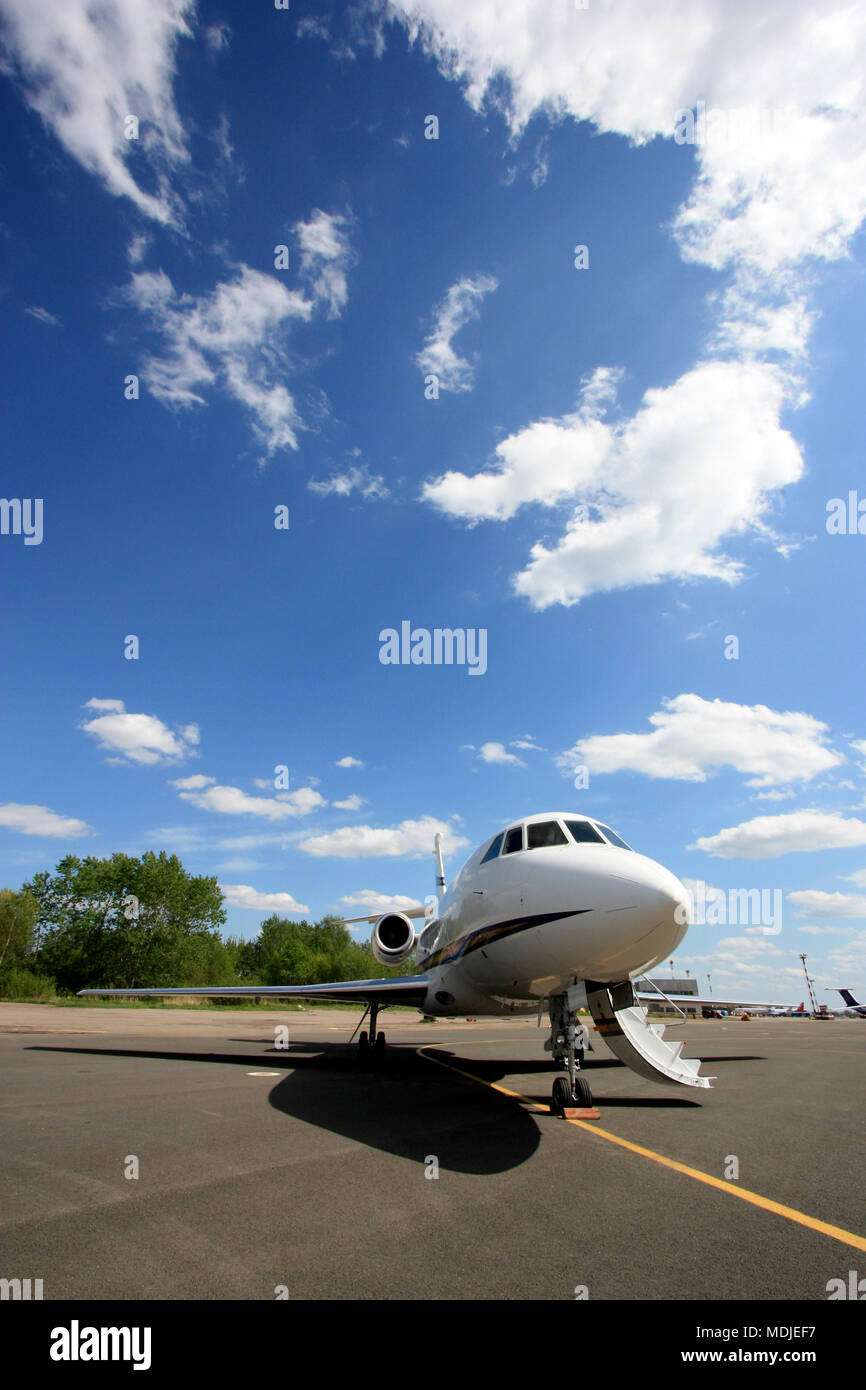 Falcon 2000 business jet is waiting for passengers and ready to go ...