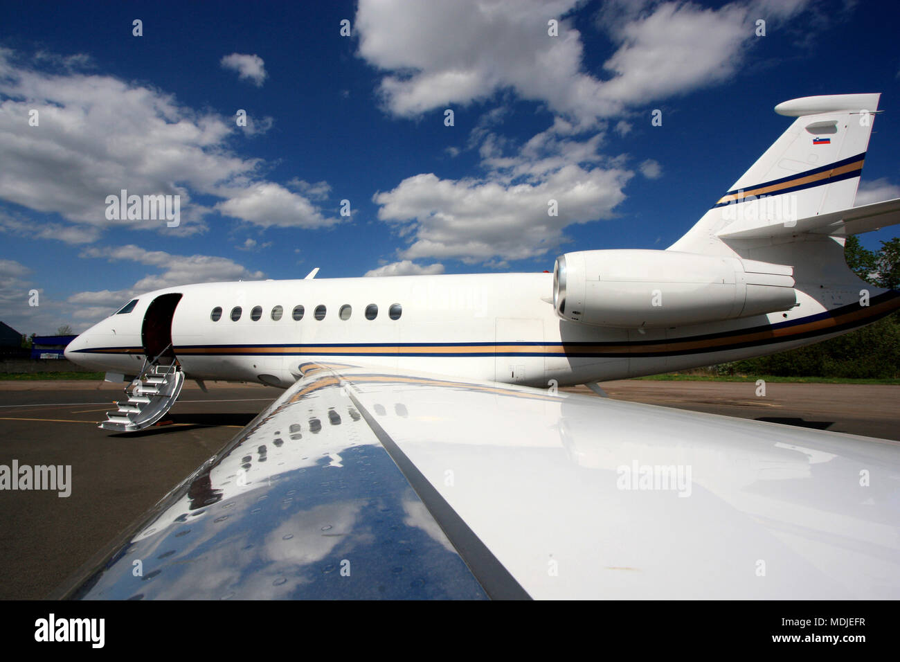 Falcon 2000 business jet is waiting for passengers and ready to go ...