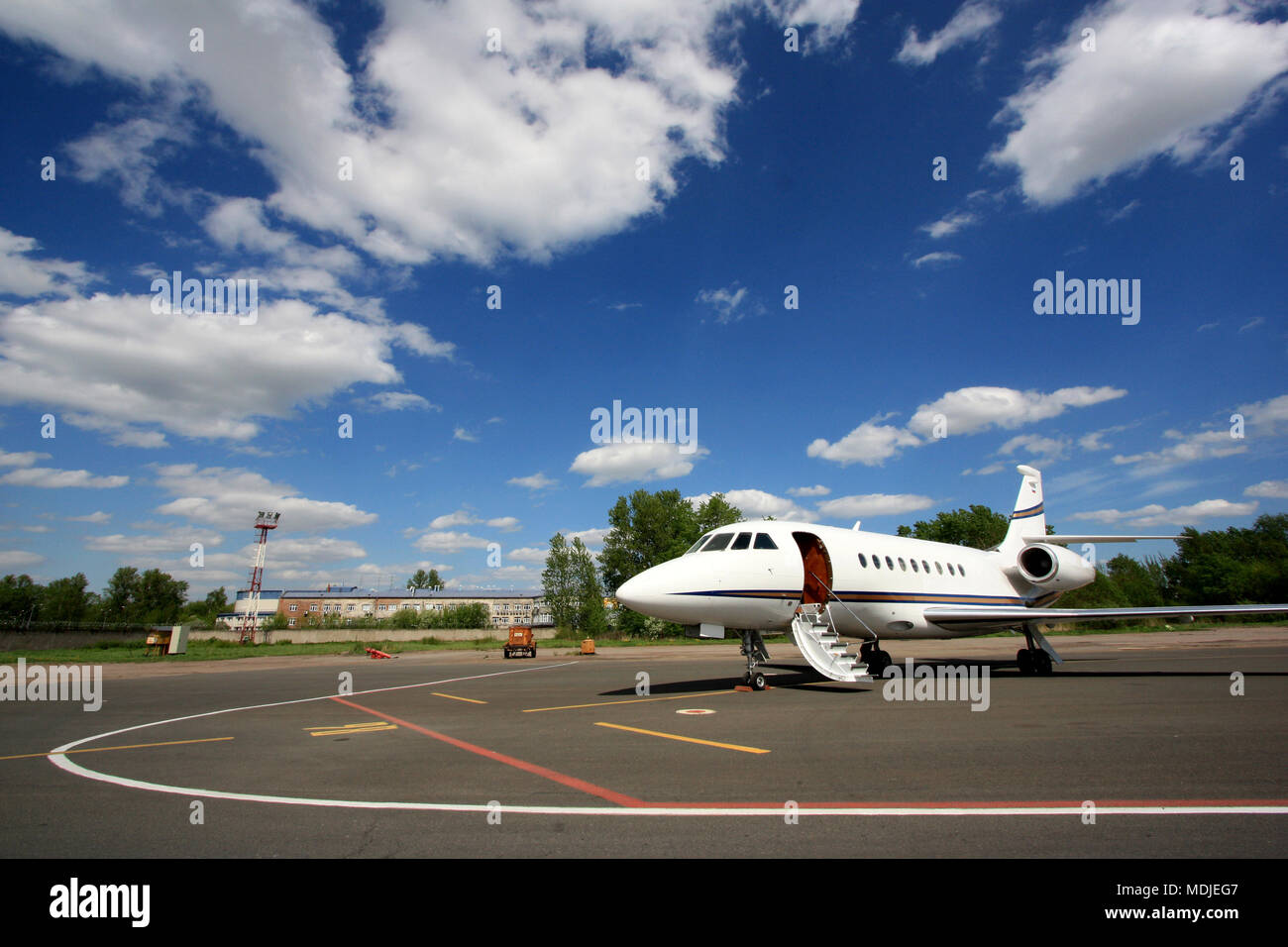 Falcon 2000 business jet is waiting for passengers and ready to go ...