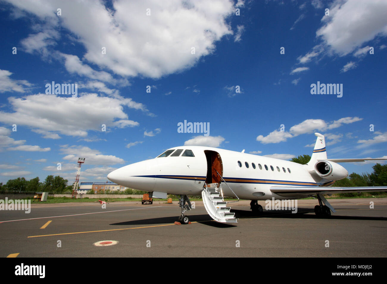 Falcon 2000 business jet is waiting for passengers and ready to go ...