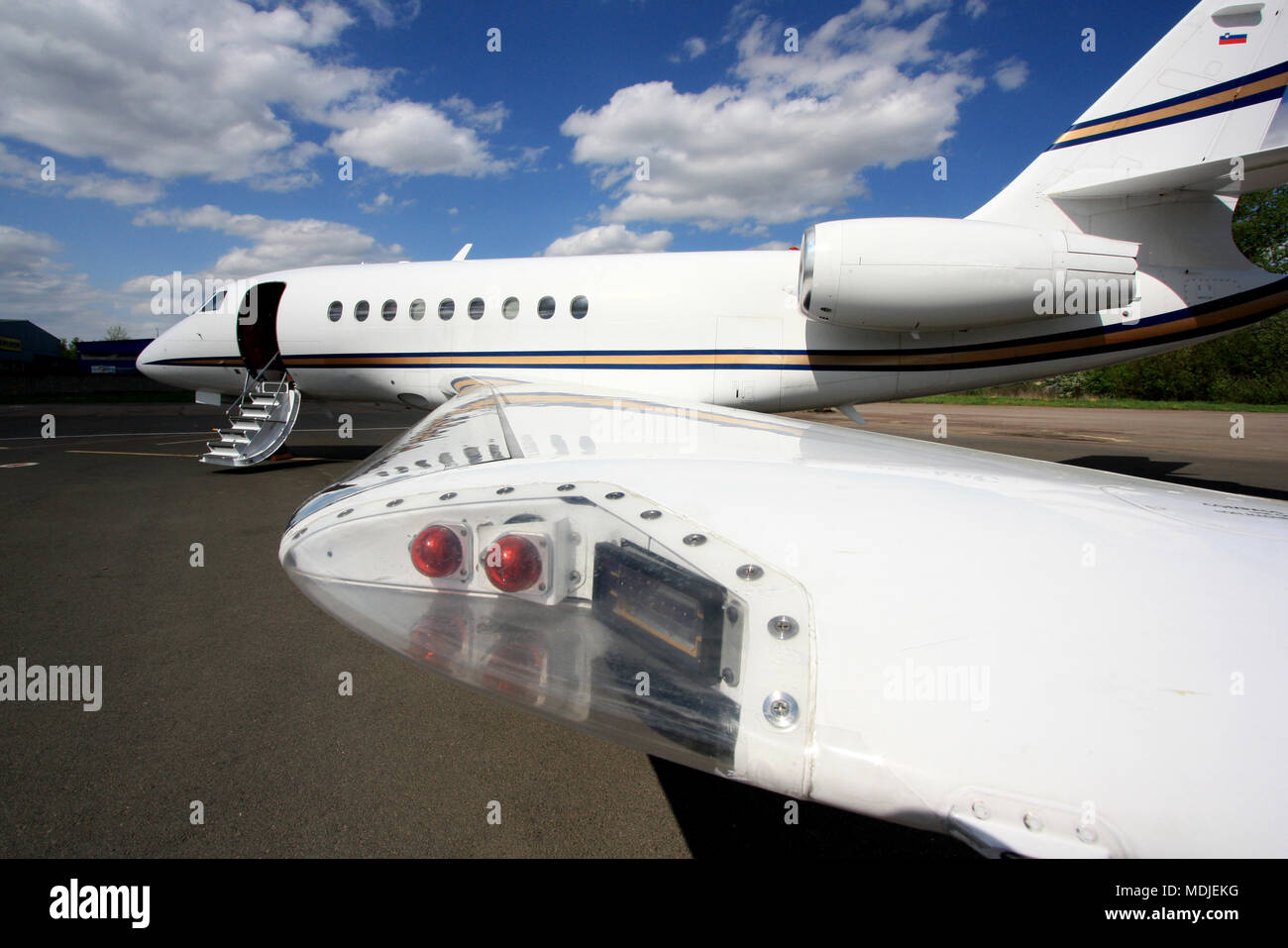 Falcon 2000 business jet is waiting for passengers and ready to go ...