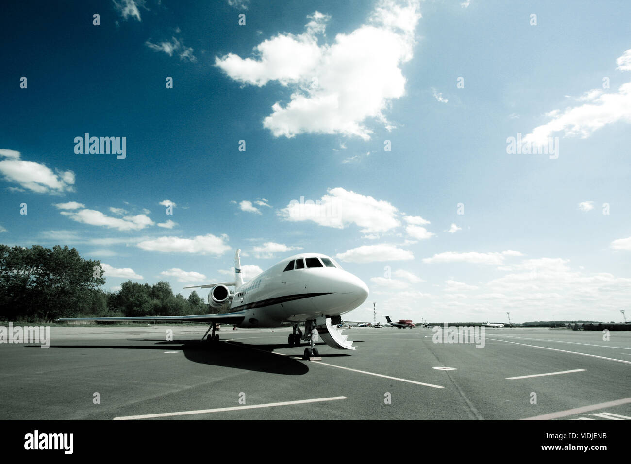 Falcon 2000 business jet is waiting for passengers and ready to go ...
