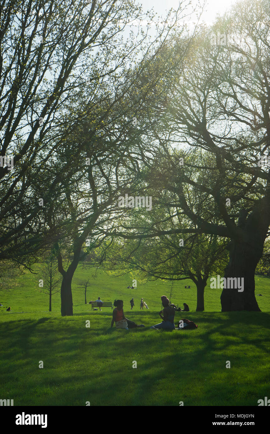 People enjoying the sunshine and warm Spring weather in Brockwell Park ...