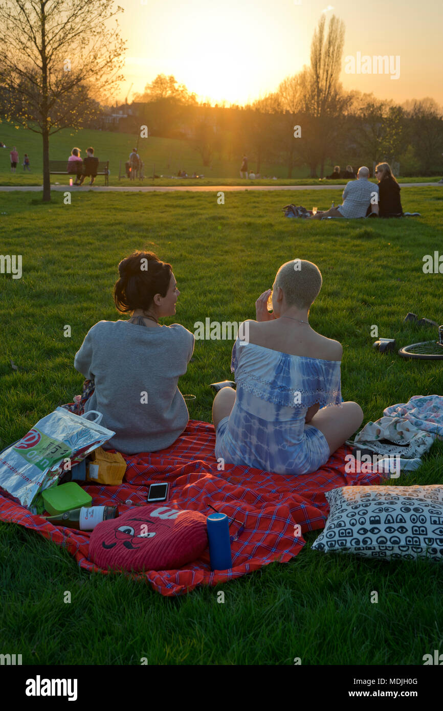People enjoying the sunshine and warm Spring weather in Brockwell Park ...