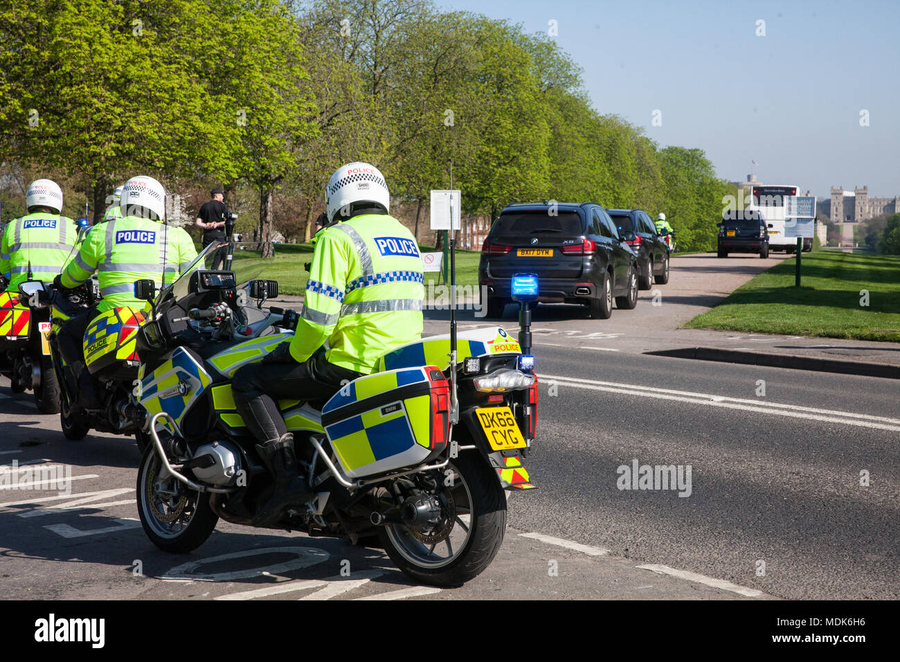 Windsor, UK. 20th April, 2018. Police motorcycle outriders facilitate ...