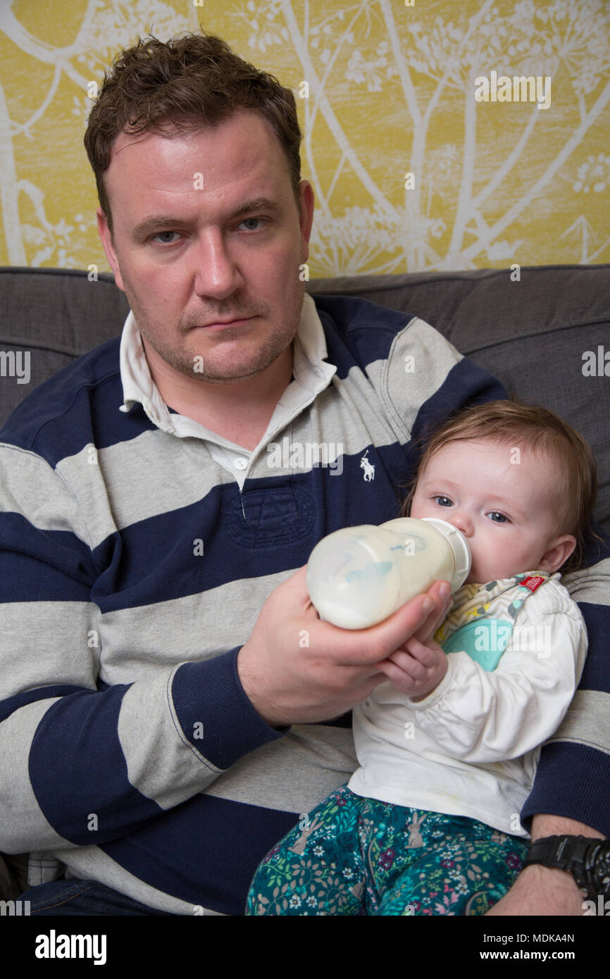 Bottle feeding baby hi-res stock photography and images - Alamy