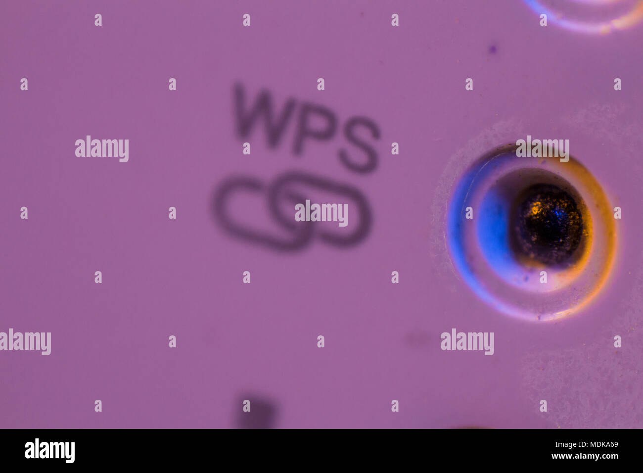 Macro closeup on WPS symbol signal connection status led light. The ...