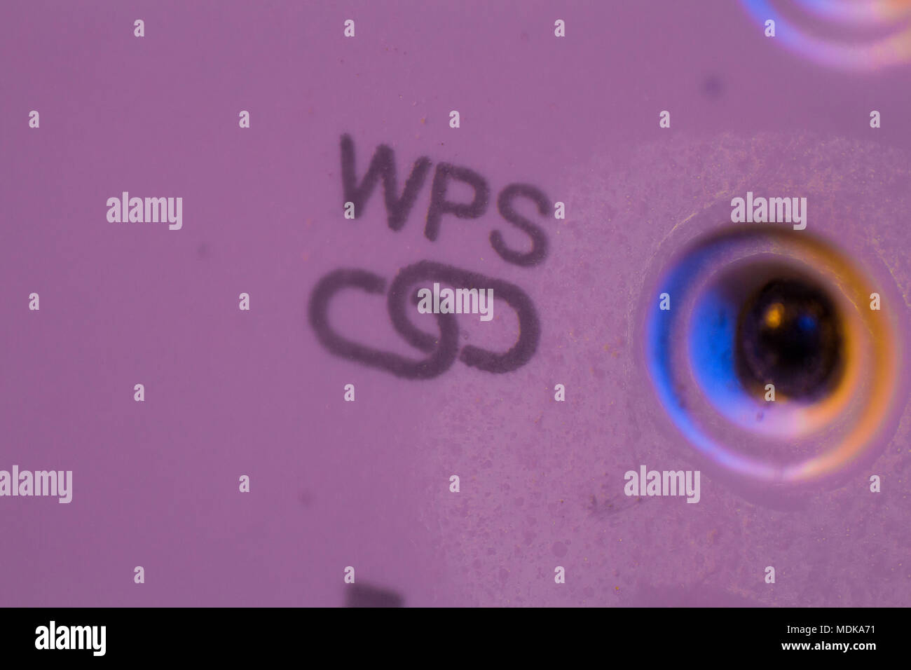 Macro closeup on WPS symbol signal connection status led light. The ...