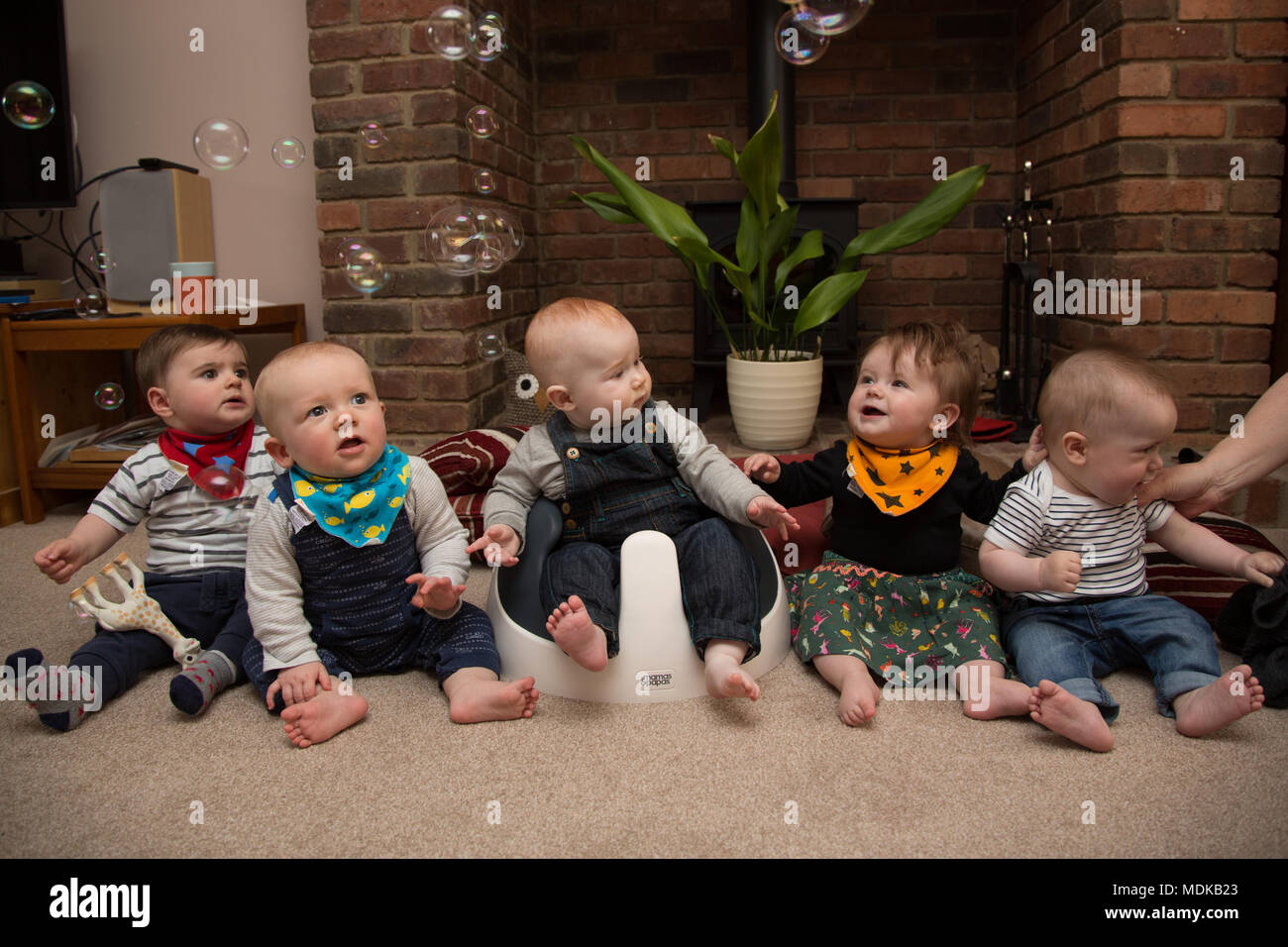 Babies playing hi-res stock photography and images - Alamy