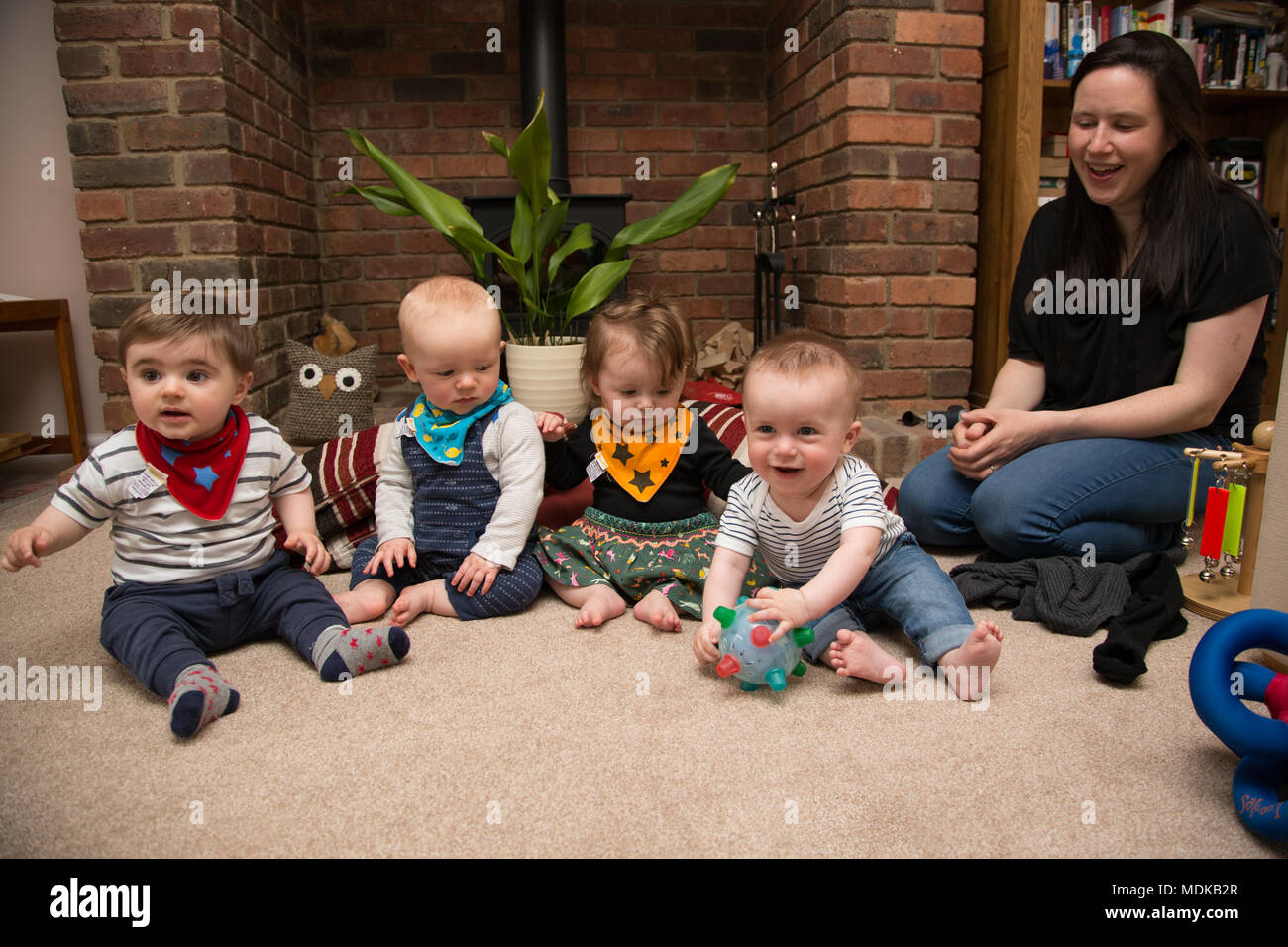 Babies playing with bubbles aged 6 & 7 Months Stock Photo - Alamy