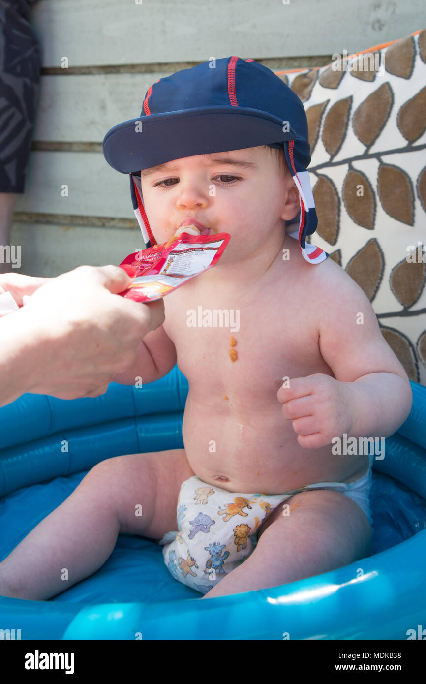 Baby wearing nappy sitting on hi-res stock photography and images - Alamy