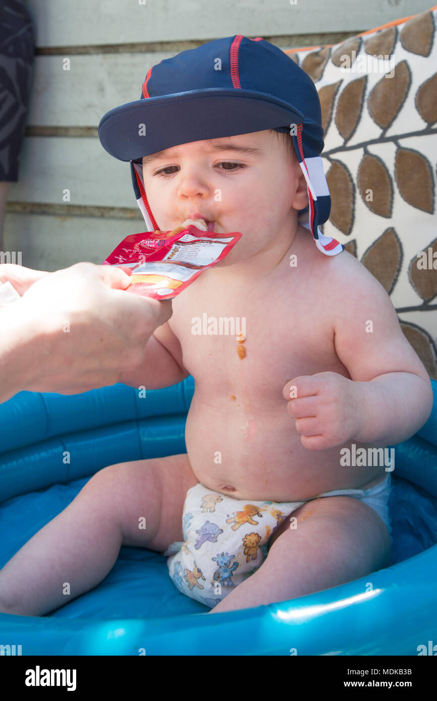 Baby wearing nappy sitting on hi-res stock photography and images - Alamy
