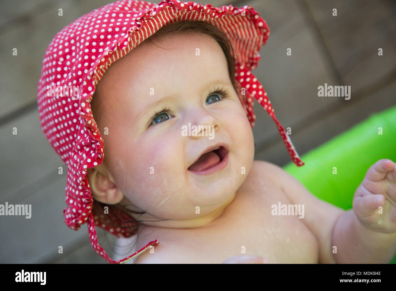Baby girl wearing hat in hi-res stock photography and images - Alamy