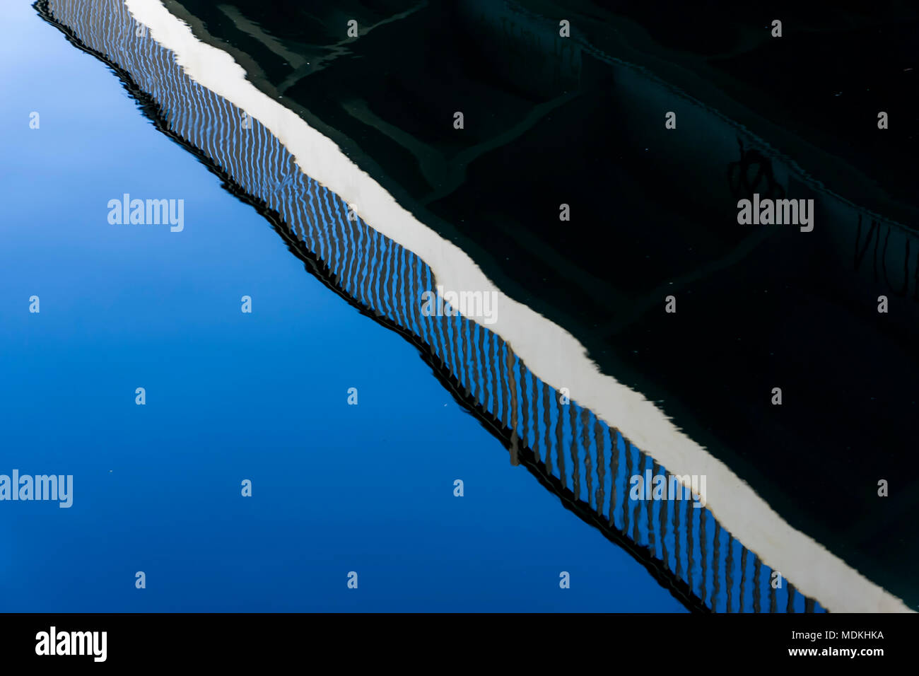 Reflection of bridge in water of Spree River Stock Photo - Alamy