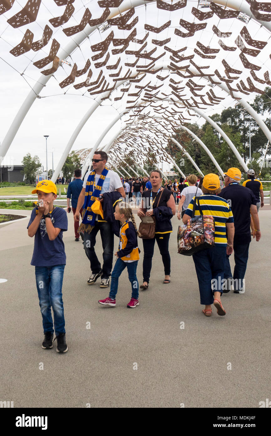 West Coast Eagles supporters walking along a walkway outside of the ...