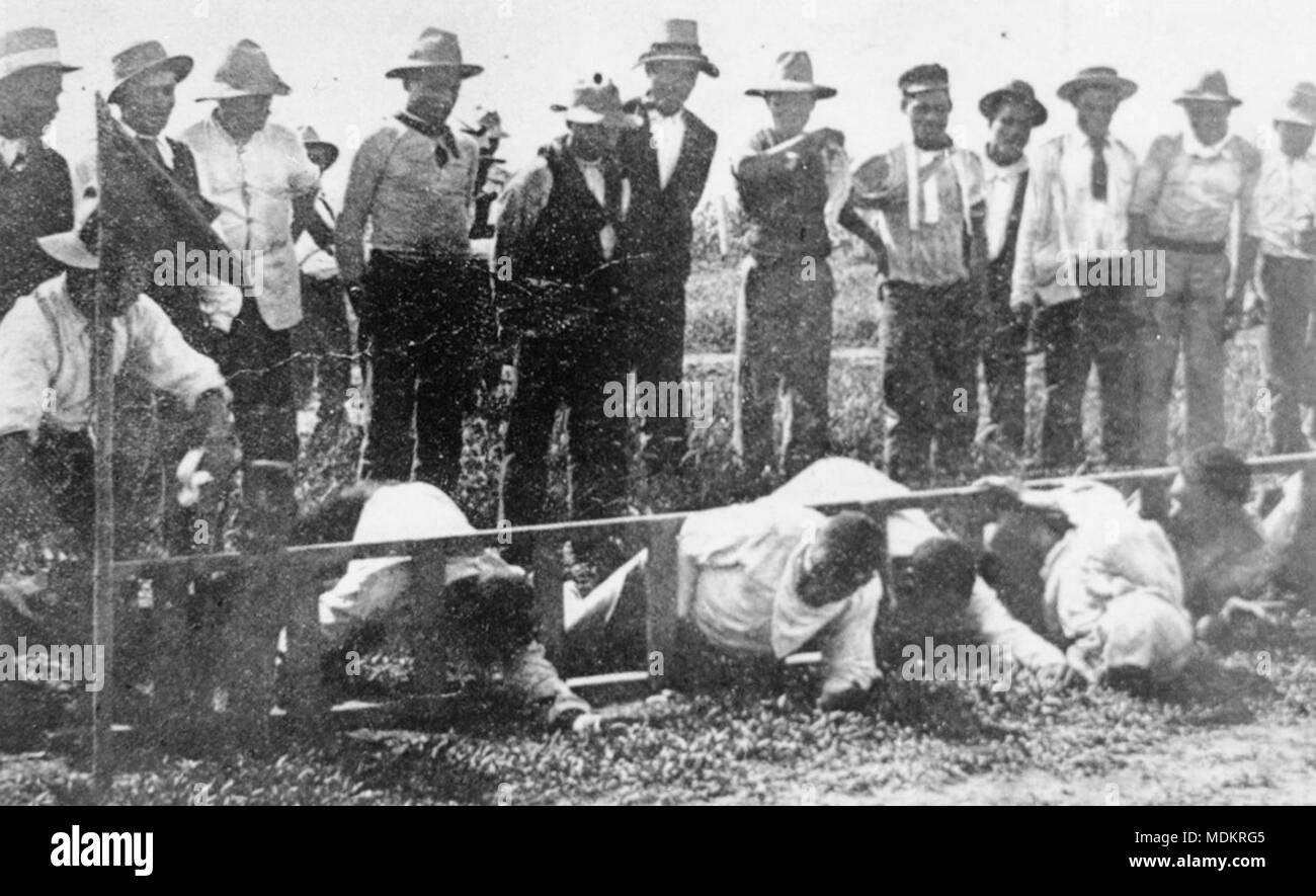 Australian South Sea Islanders participating in an obstacle race in ...