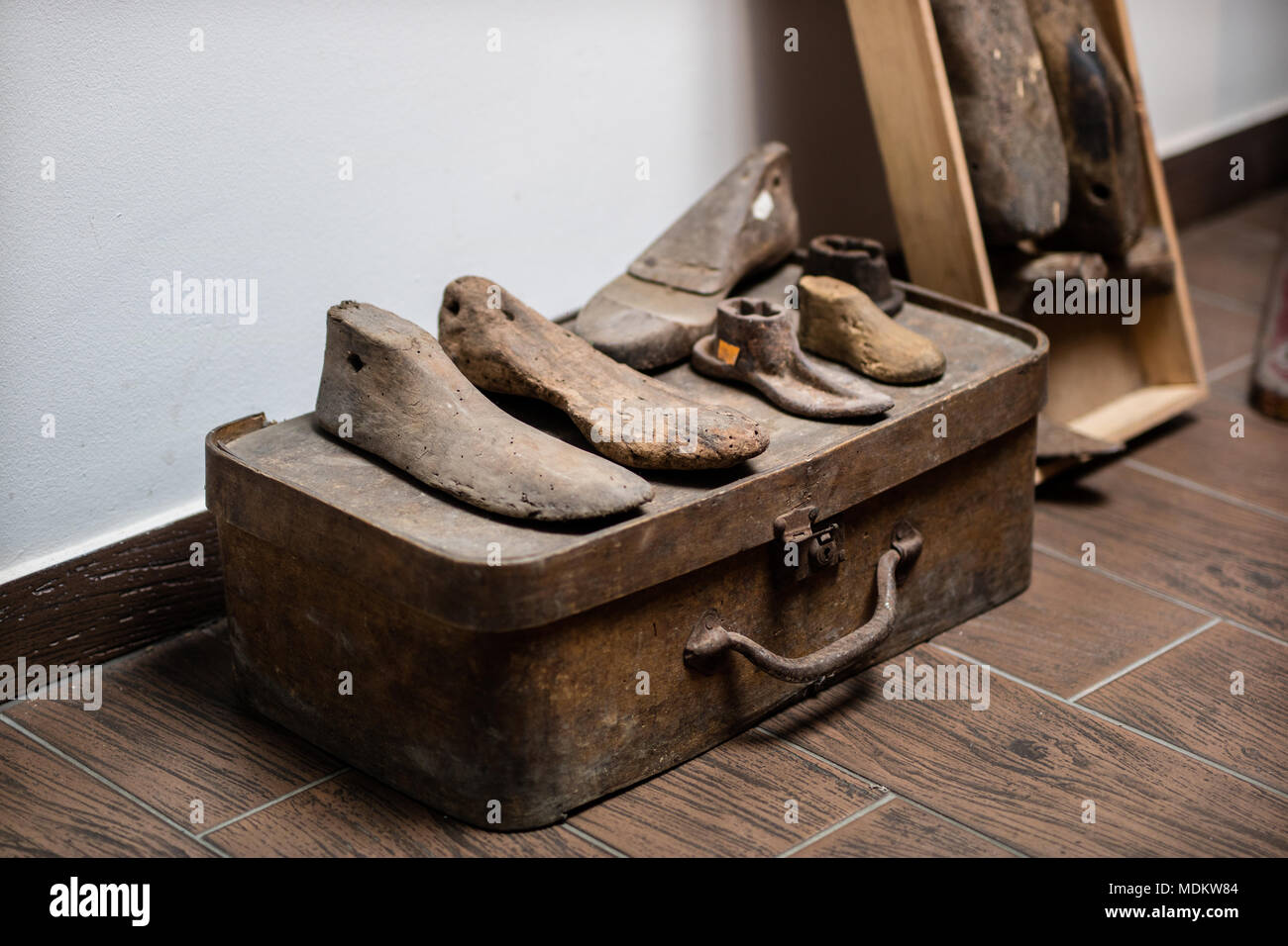 Old shoe shoelaces. Historic shoemaker's factory and accessories ...