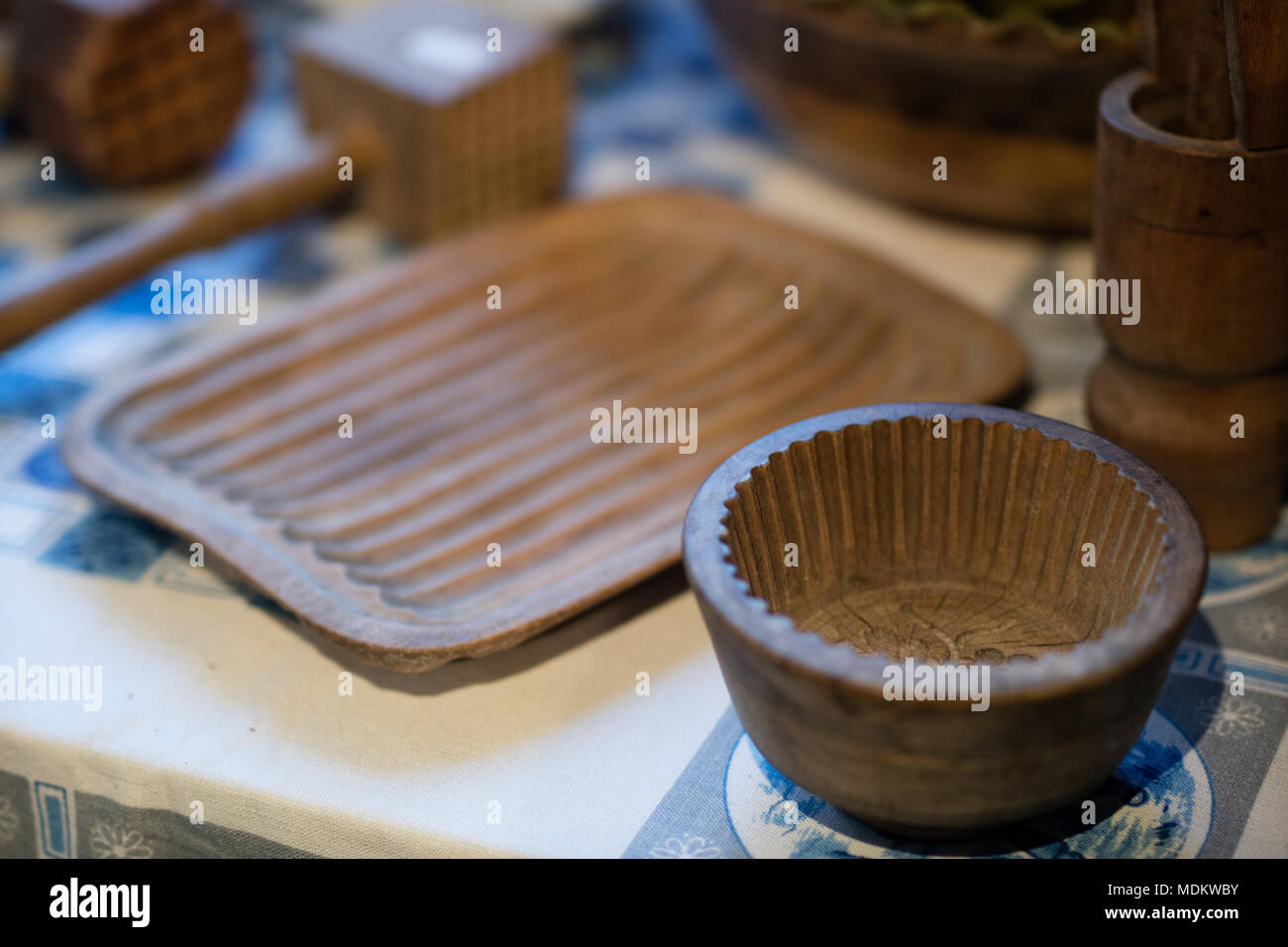 Old cooking tools on a wooden kitchen table. Accessories for cooking in ...
