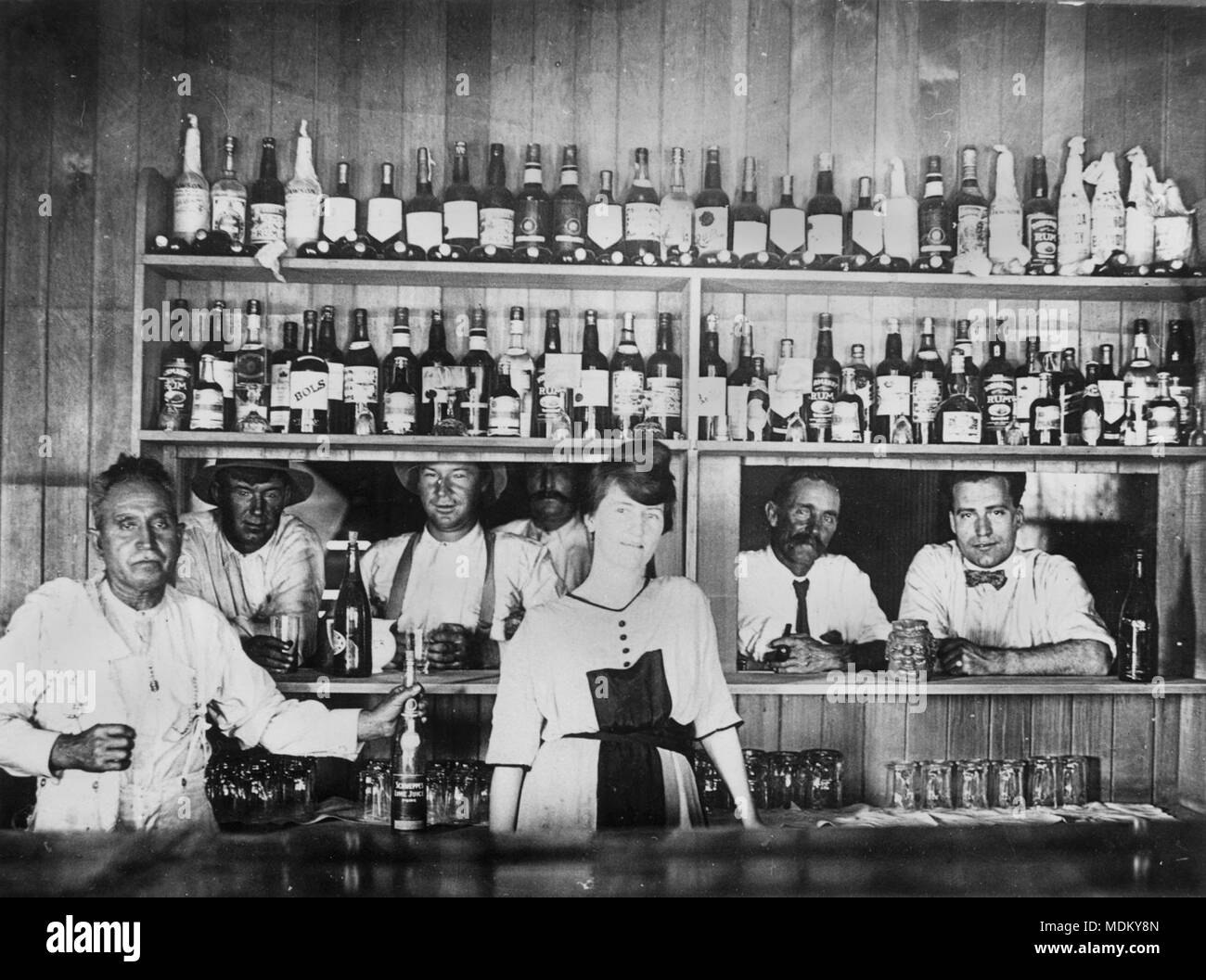 Drinking at the bar of the Quilpie Hotel ca 1921 Stock Photo - Alamy