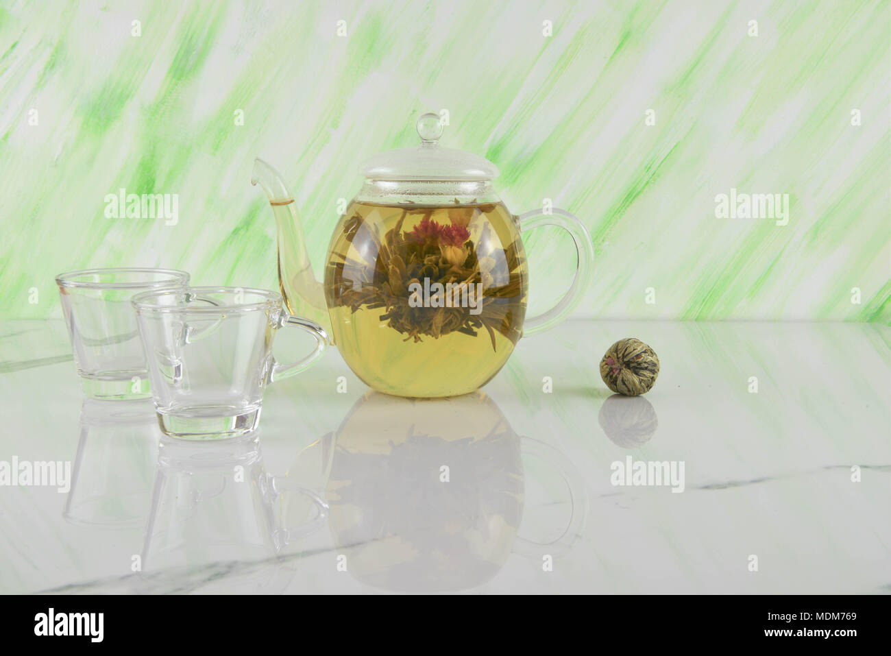 flower tea in glass teapot with bloom ball Stock Photo - Alamy