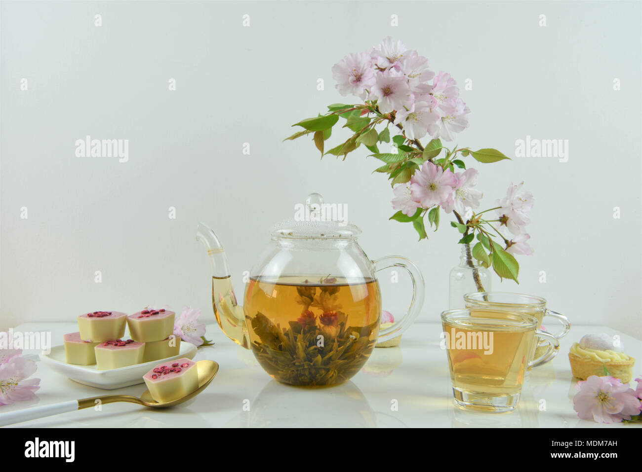 summer time flowering tea in glass teapot Stock Photo - Alamy