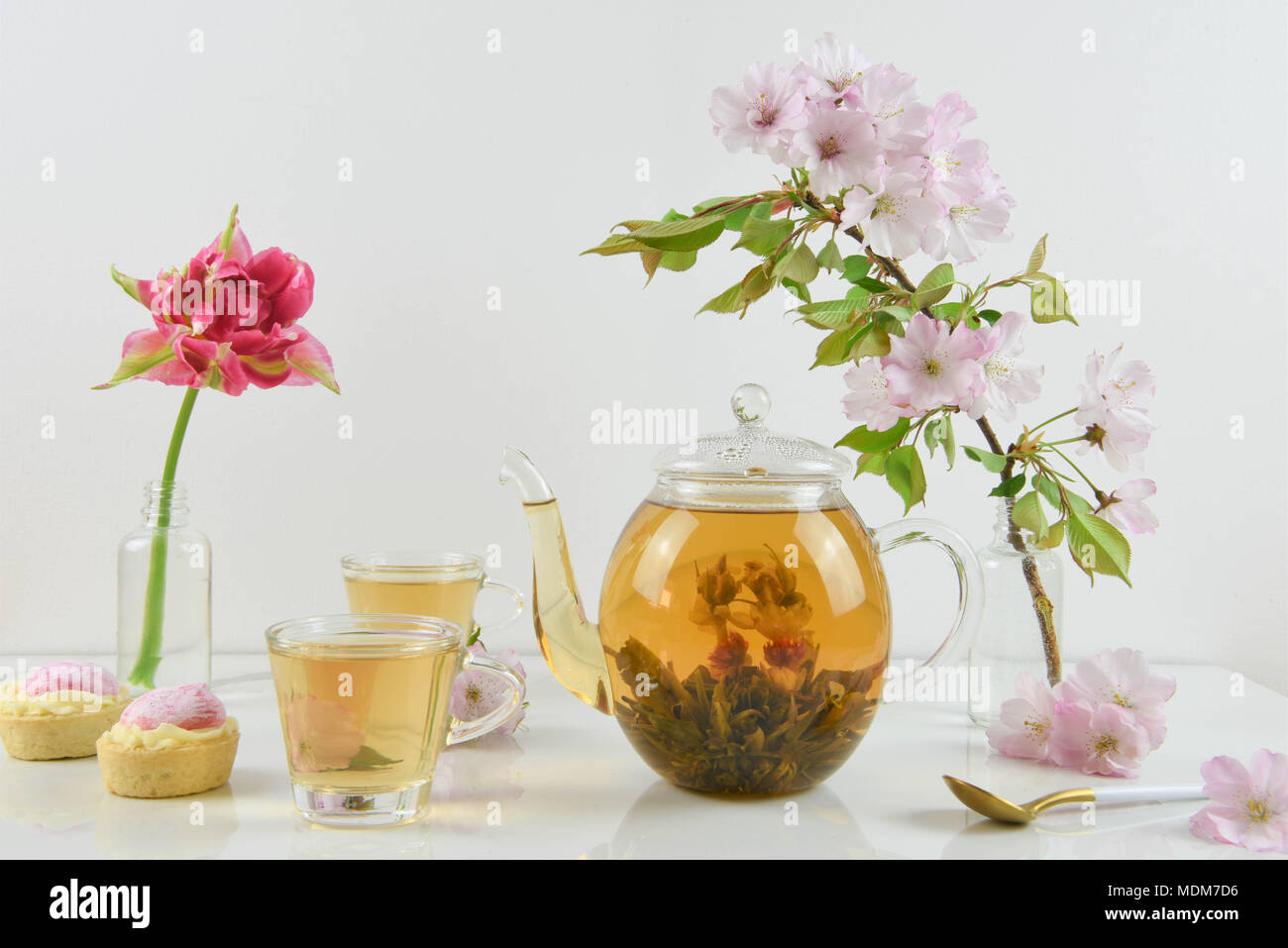 summer time flowering tea in glass teapot Stock Photo - Alamy