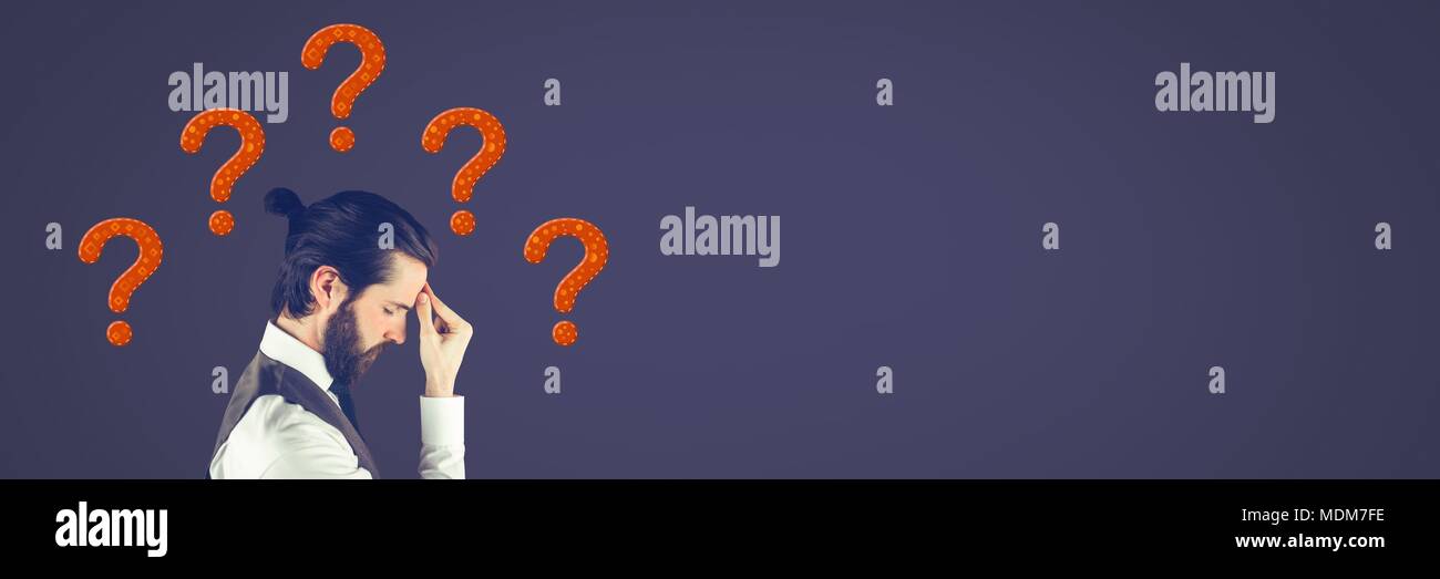 Man thinking with purple stitched question marks Stock Photo - Alamy