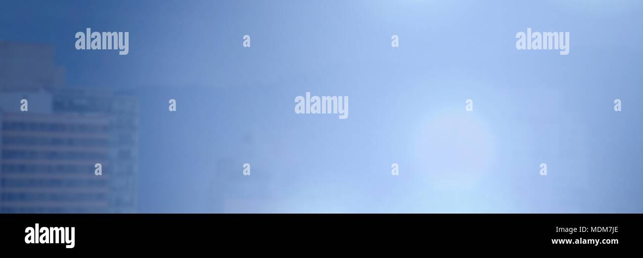 City buildings with flare light source Stock Photo - Alamy