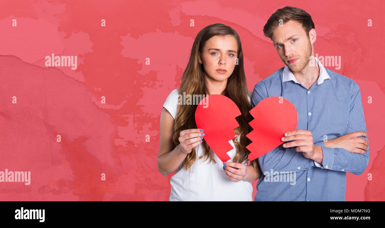 Couple holding broken heart Stock Photo - Alamy