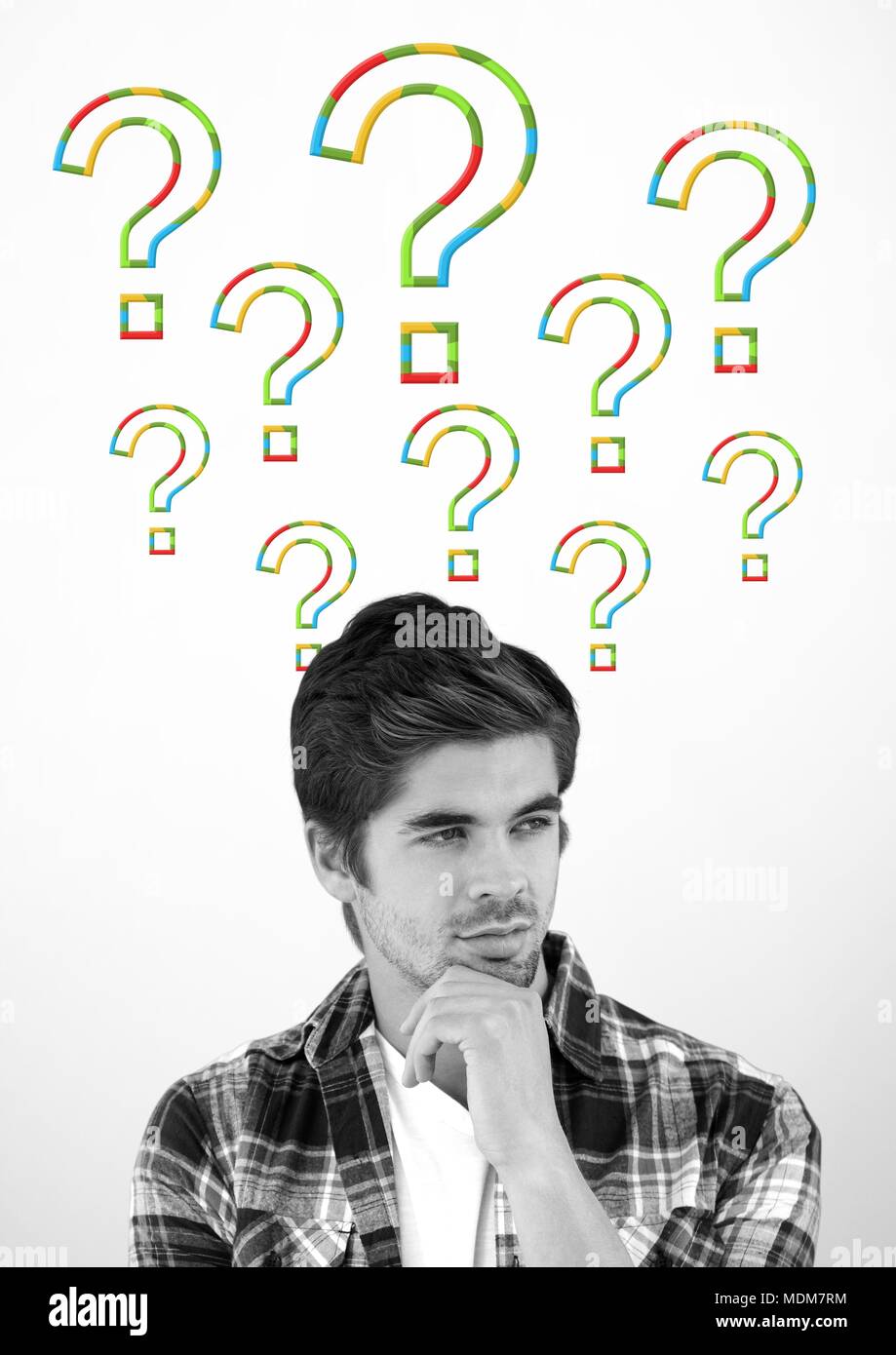 Man thinking with colorful question marks Stock Photo - Alamy