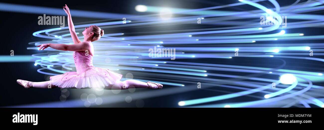 Ballet dancer dancing with digital technology interface and light ...