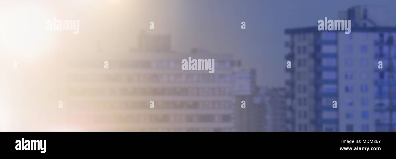 City buildings with flare light source Stock Photo - Alamy