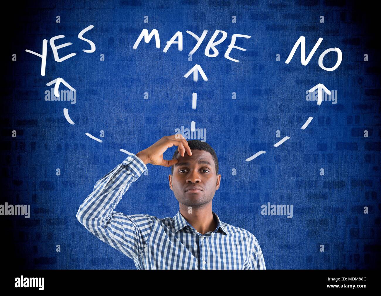 Man thinking Yes No Maybe text with arrows graphic on wall Stock Photo ...