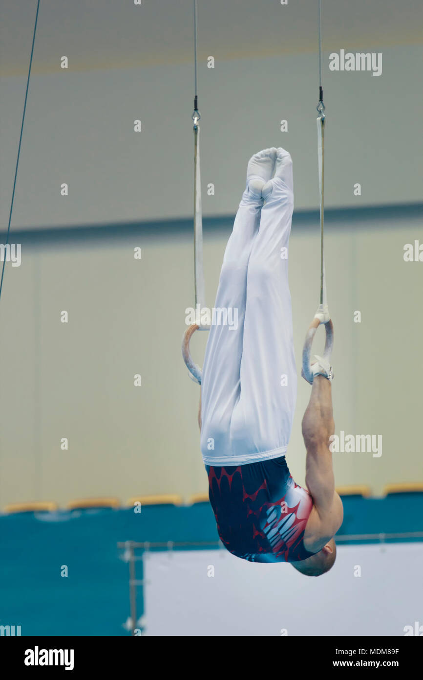 Boy gymnastic rings hi-res stock photography and images - Alamy