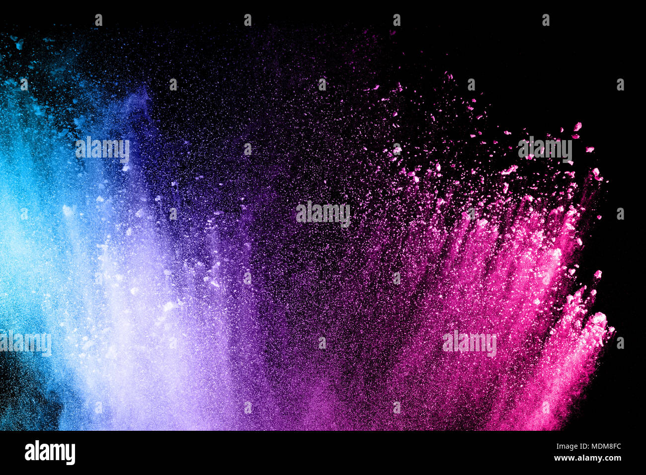 Multi color powder explosion isolated on black background Stock Photo ...