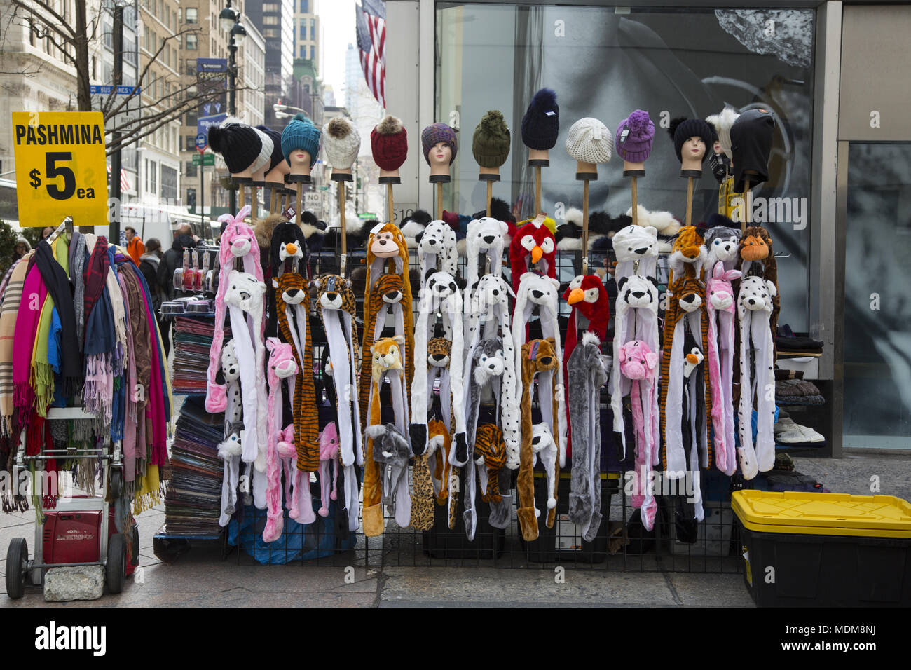 Hat vendor displays his wears along 5th Avenue in midtown Manhattan in ...