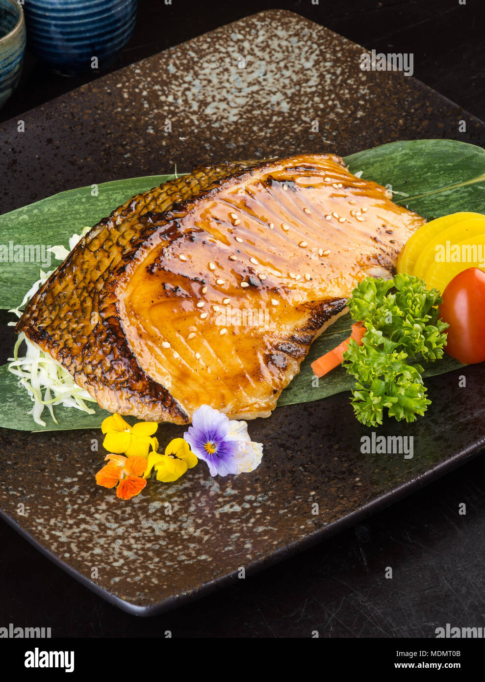 japanese cuisine. fried fish on background Stock Photo - Alamy