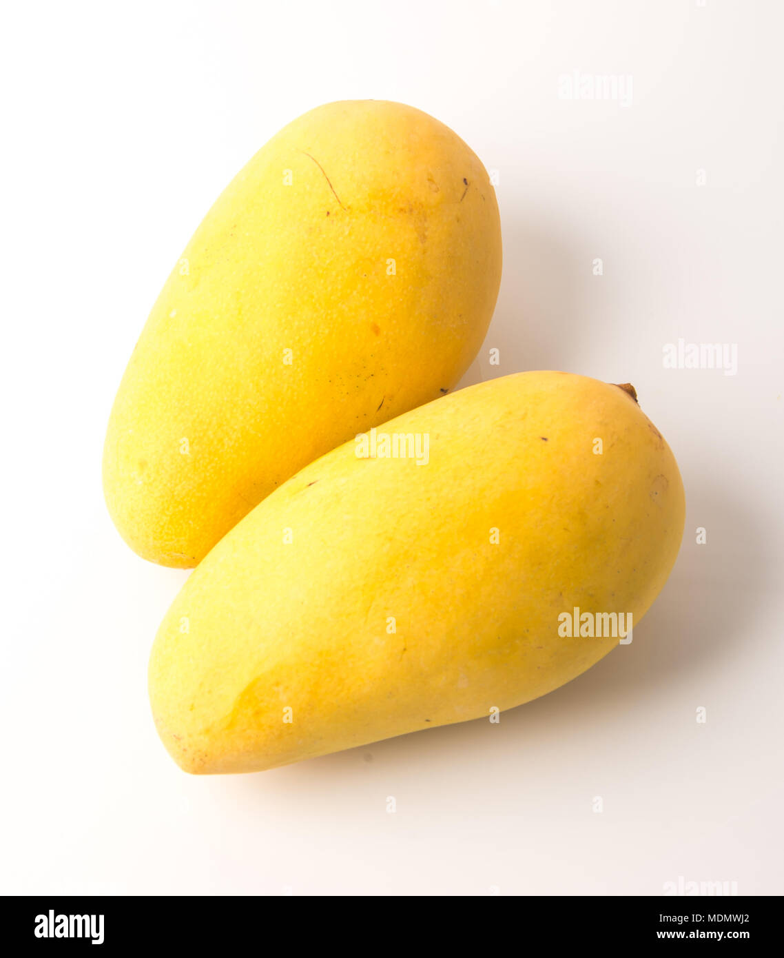 mango. yellow mango on the background Stock Photo - Alamy