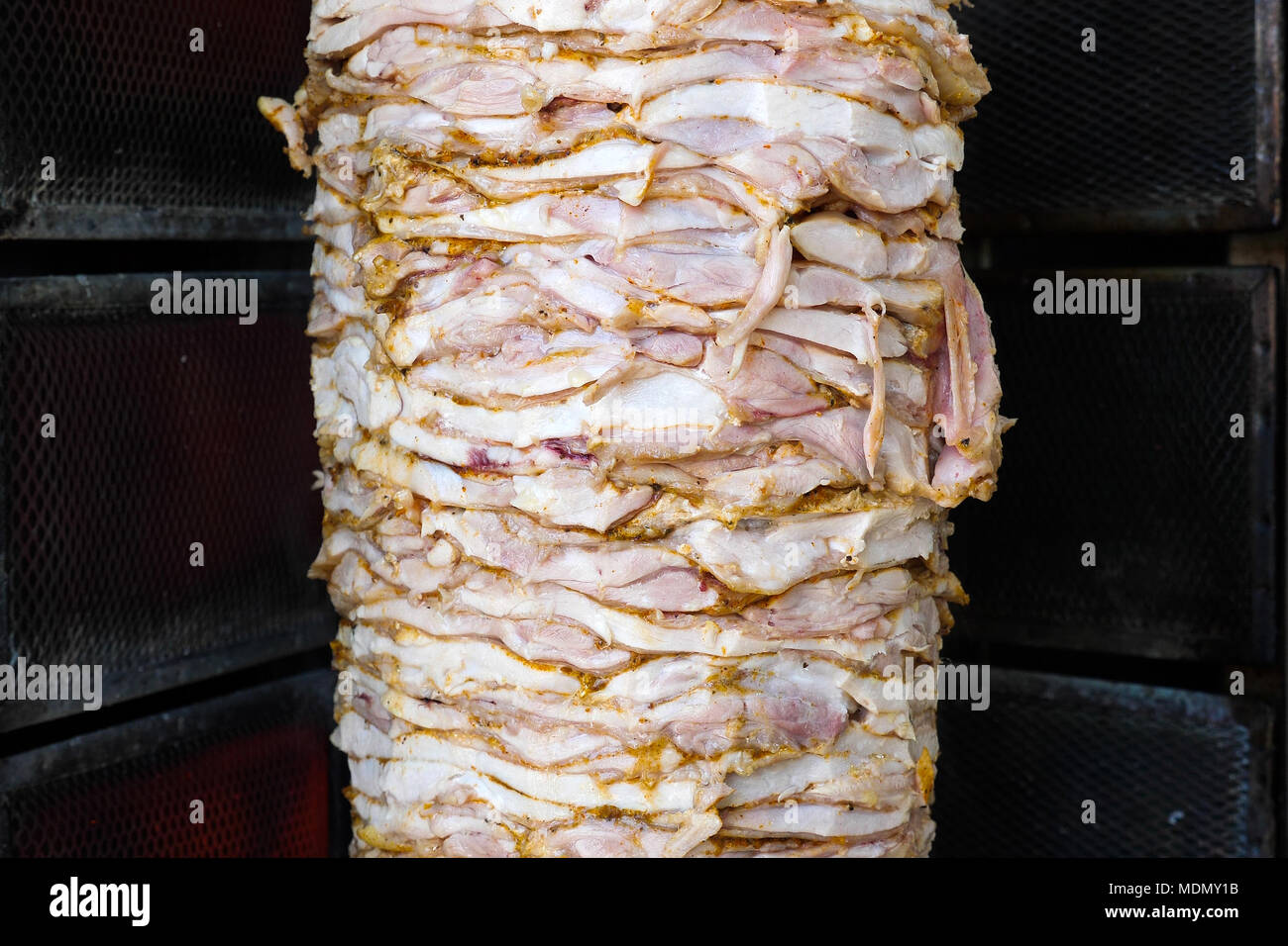Large Gyros skewer spinning in a local restaurant Stock Photo - Alamy